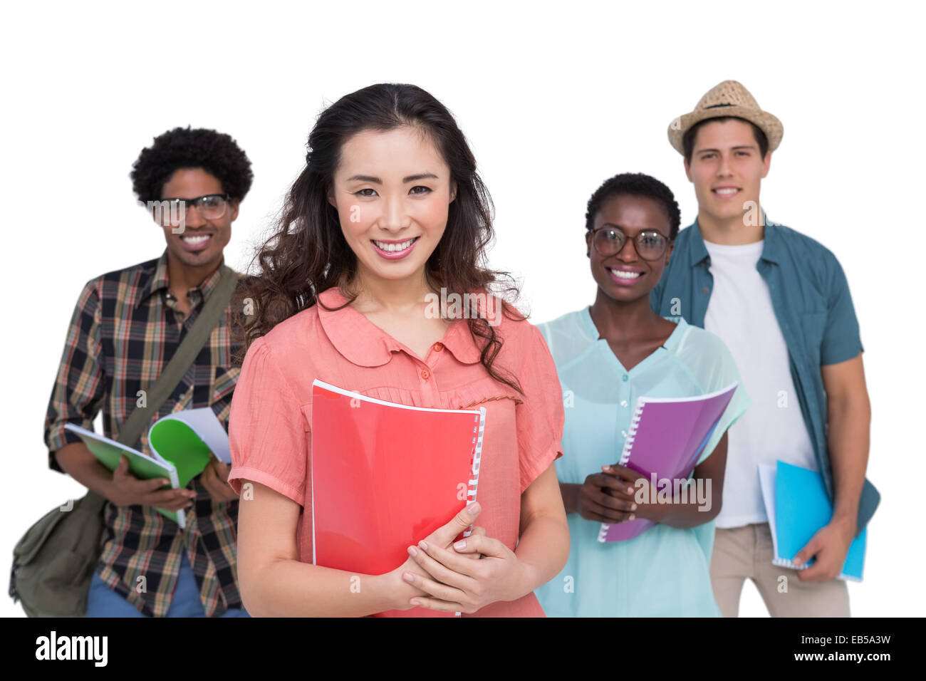 Stylish students smiling at camera together Stock Photo - Alamy