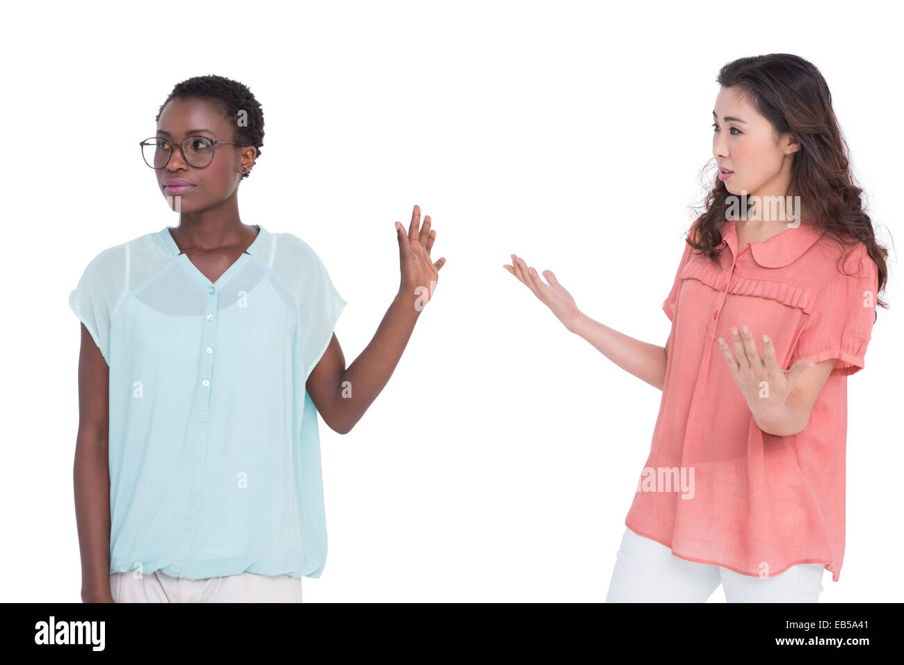Female friends having a disagreement Stock Photo - Alamy