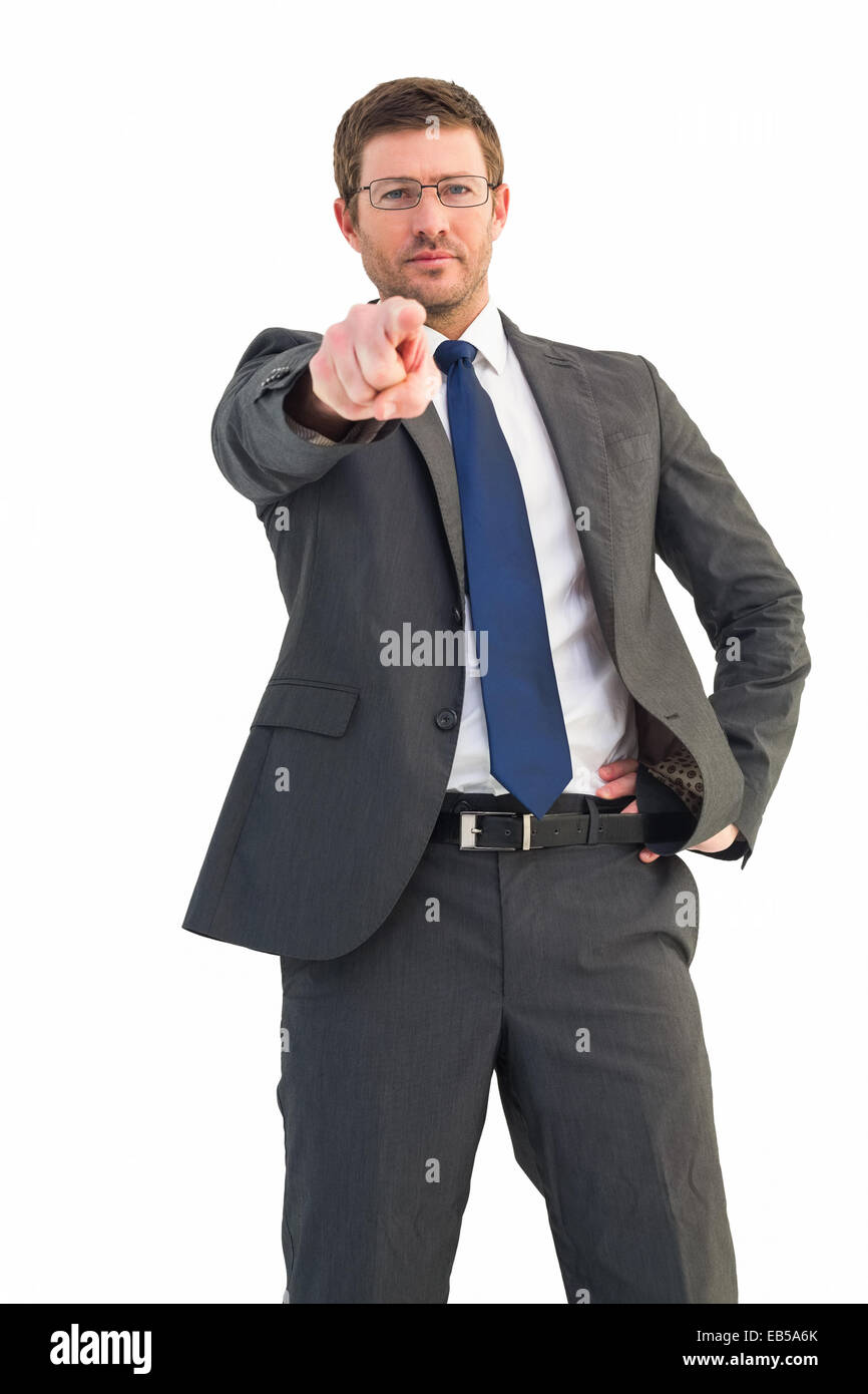 Frowning businessman pointing at camera Stock Photo - Alamy