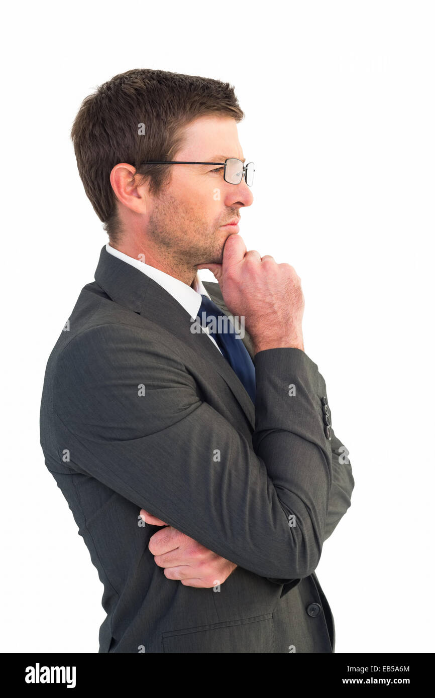 Frowning businessman thinking Stock Photo - Alamy