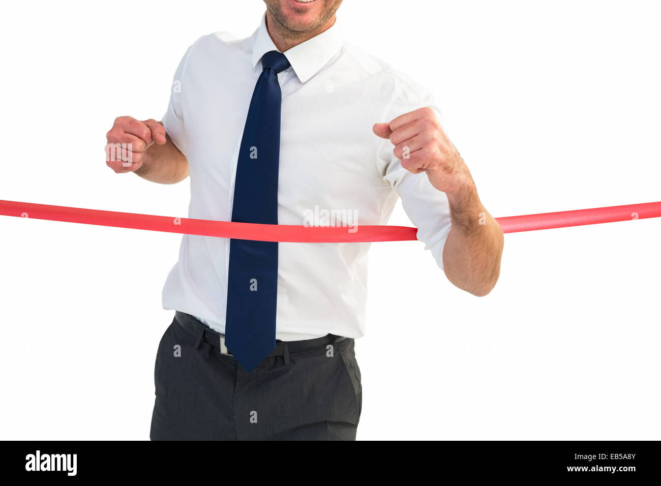 Businessman crossing the finish line Stock Photo - Alamy