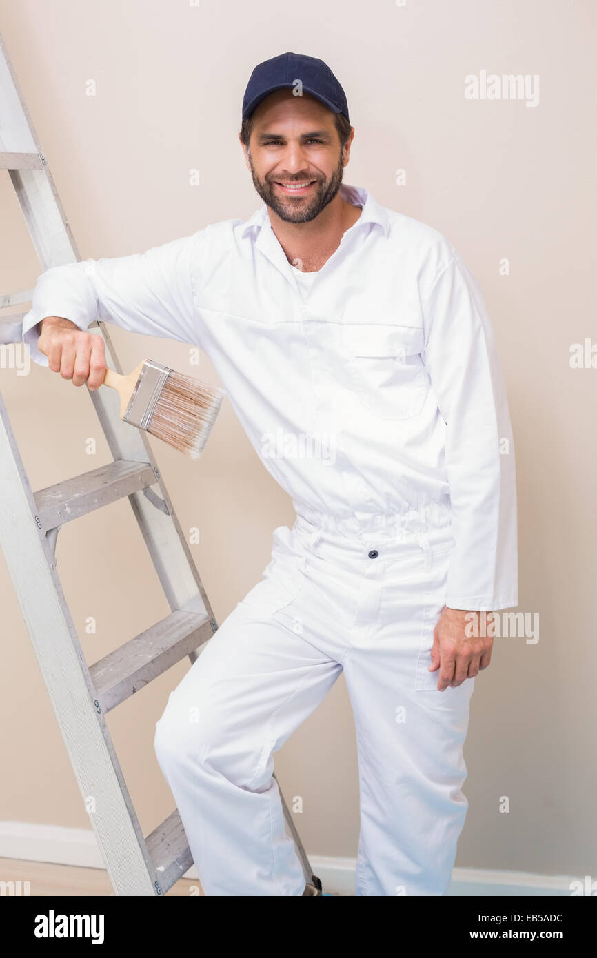 Painter smiling at the camera Stock Photo - Alamy