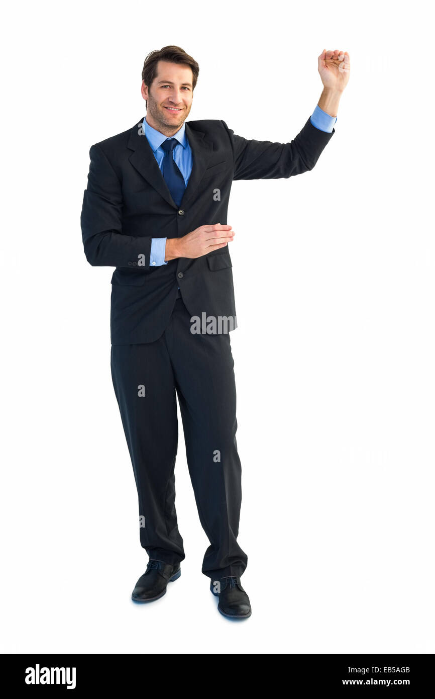 Businessman presenting with his hands Stock Photo - Alamy