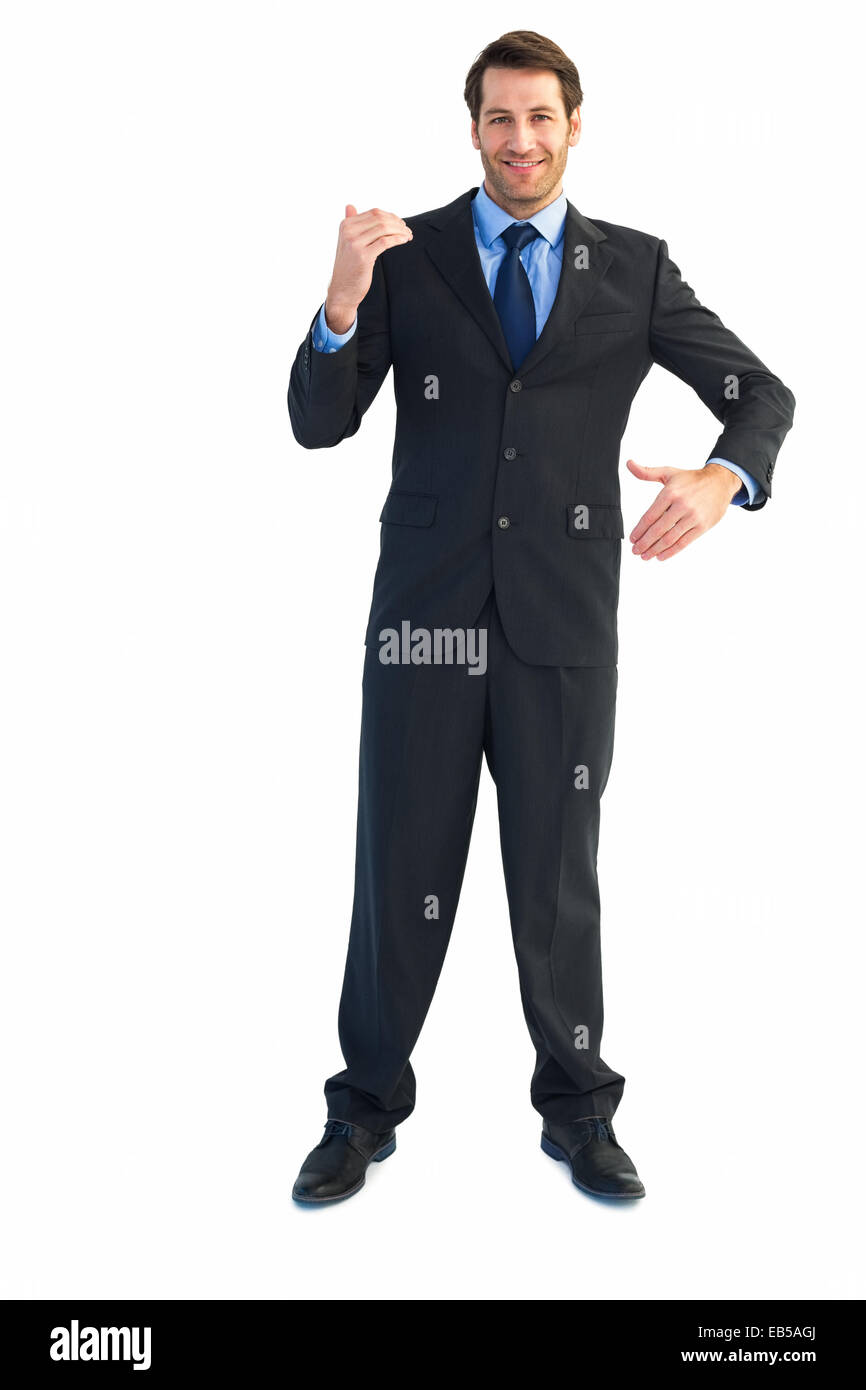 Businessman carrying something with his hands Stock Photo - Alamy
