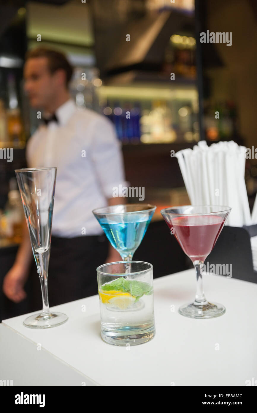 Three color cocktails preparing on the bar counter Stock Photo - Alamy