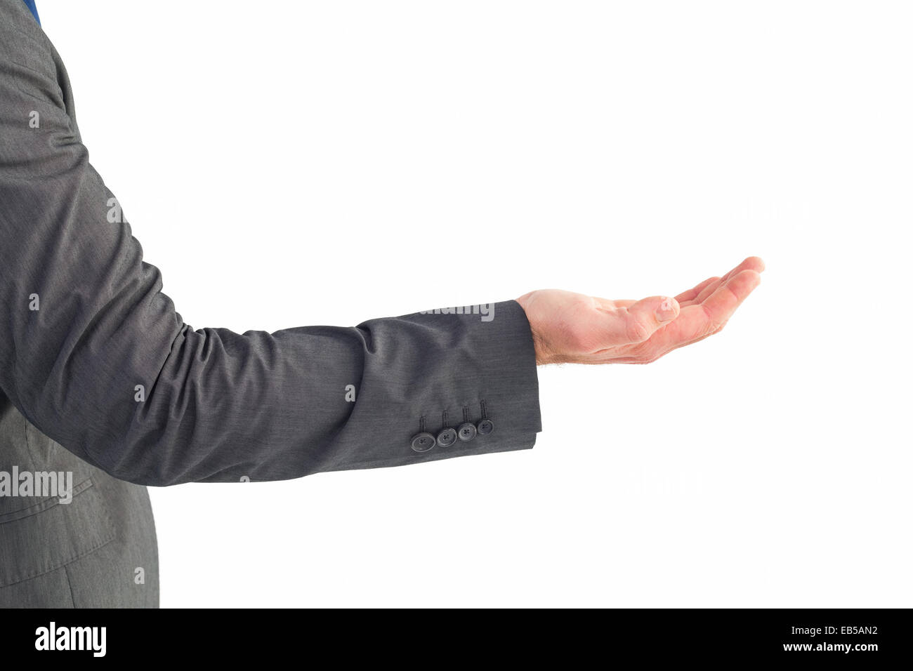Businessman holding his hand out Stock Photo - Alamy