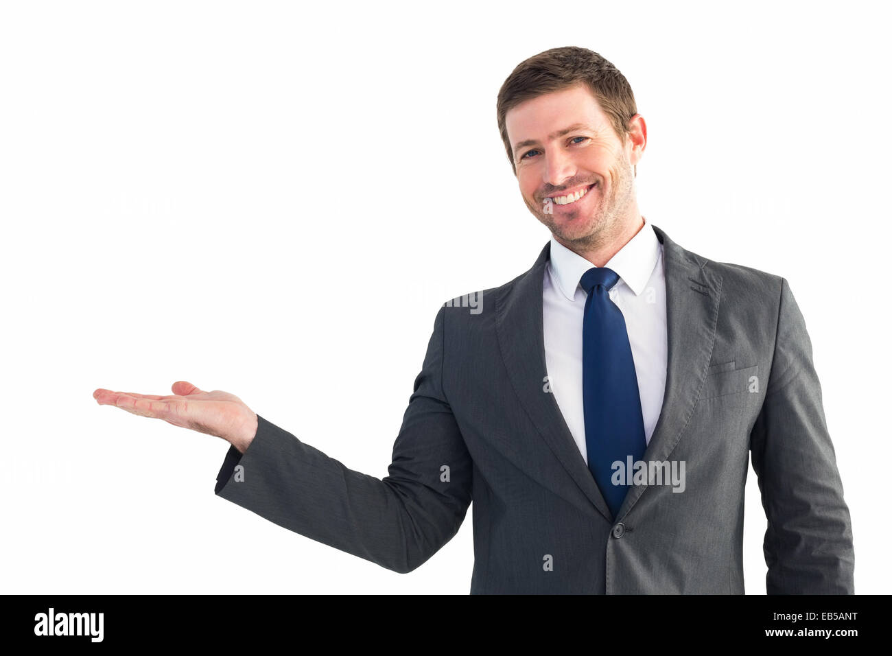 Businessman with his hand out Stock Photo - Alamy