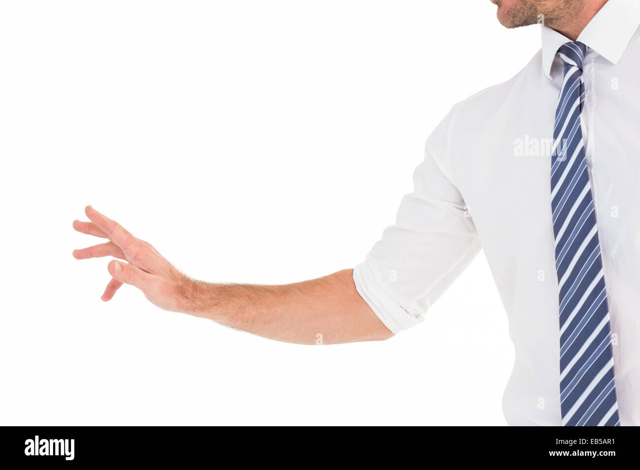 Businessman holding his hand out Stock Photo - Alamy