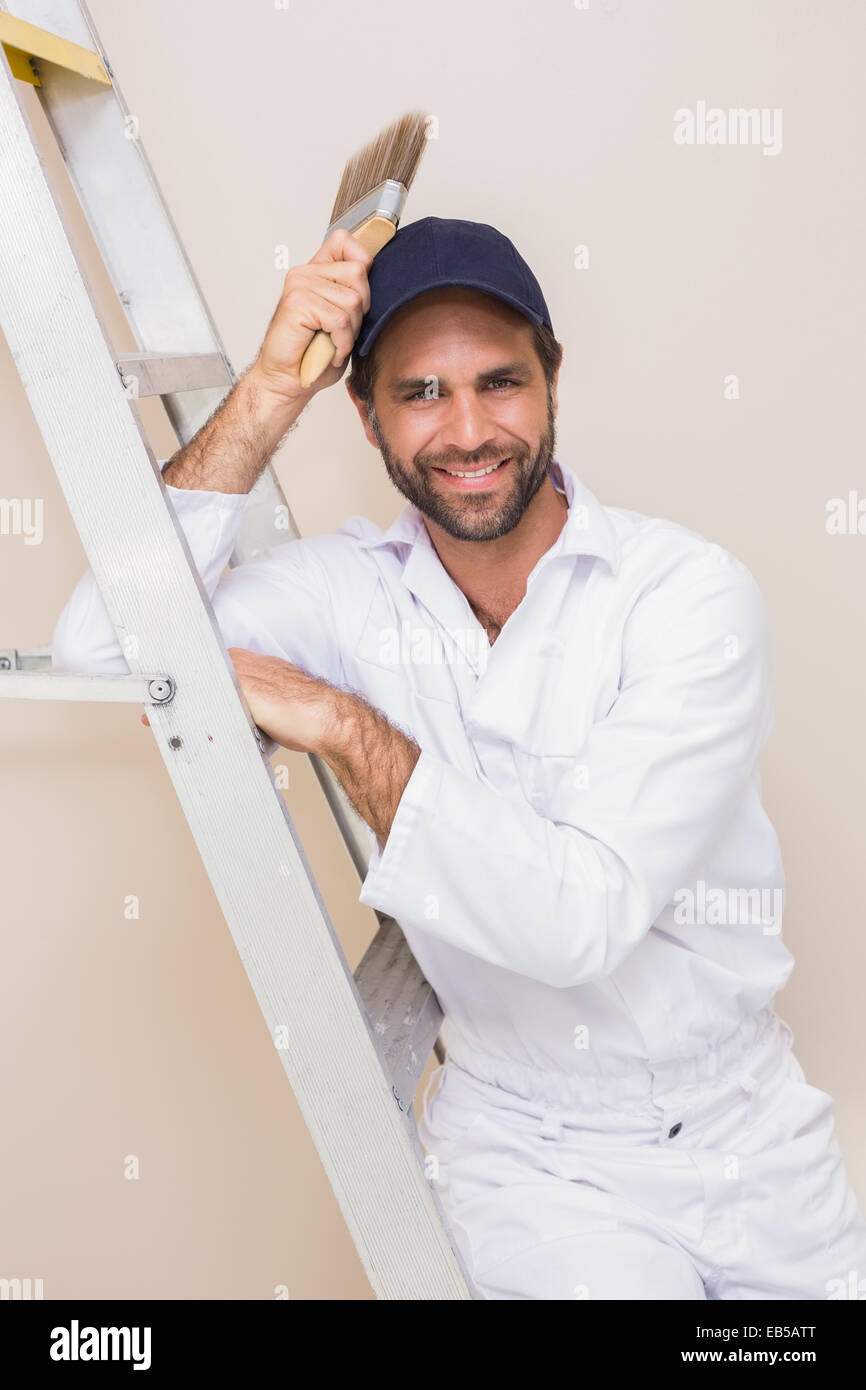 Painter smiling at the camera Stock Photo - Alamy