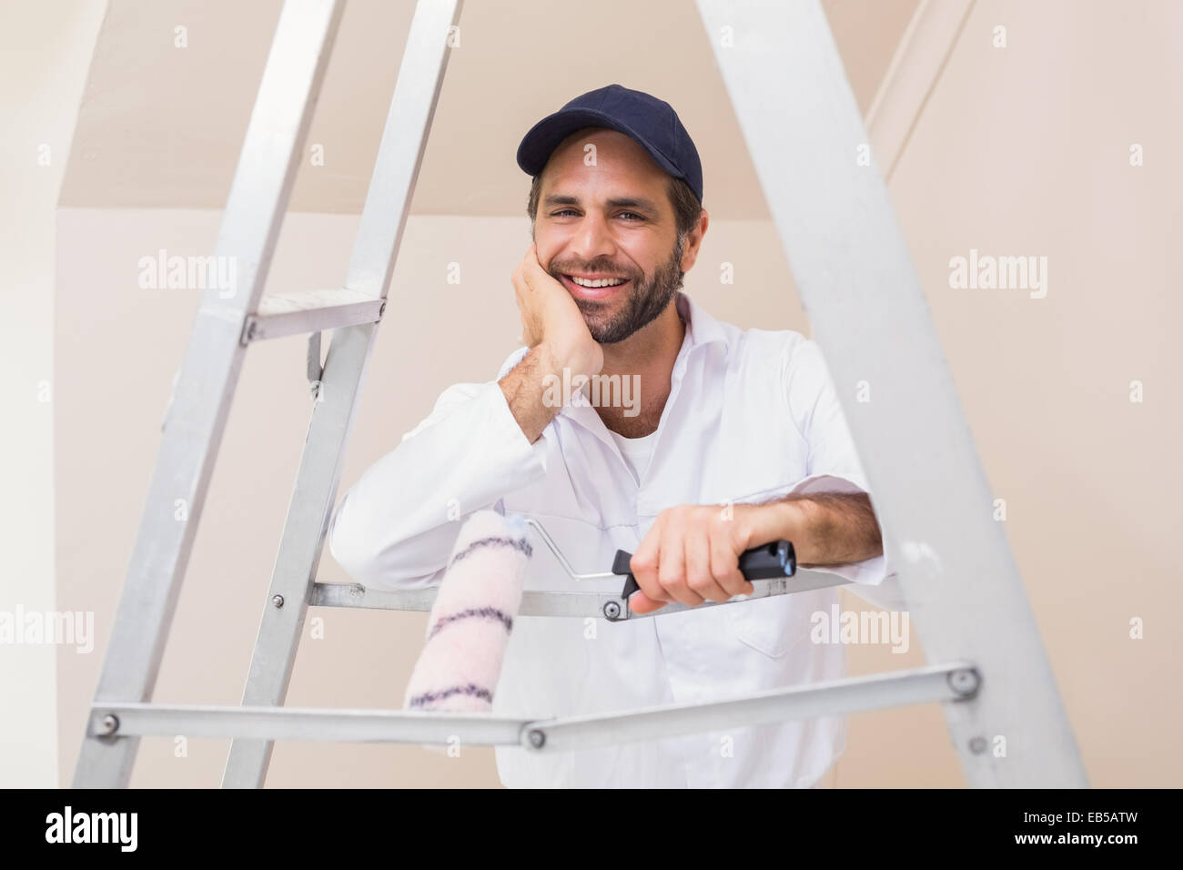 Painter smiling at the camera Stock Photo - Alamy