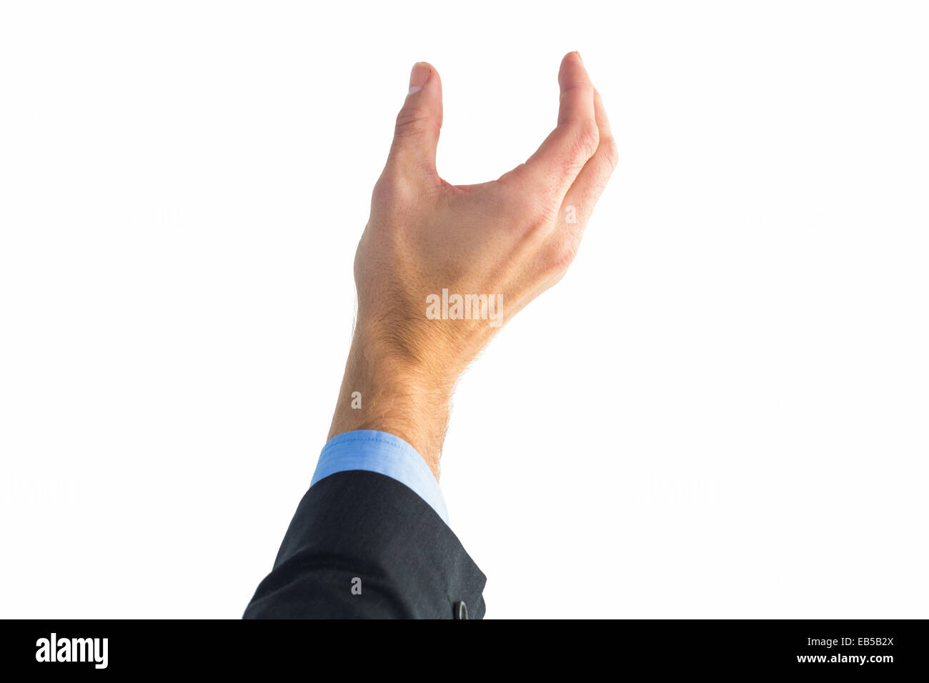 Businessman holding hand out in presentation Stock Photo - Alamy