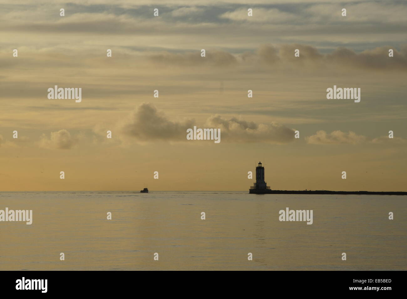 Harbor Light House Sunrise Stock Photo - Alamy