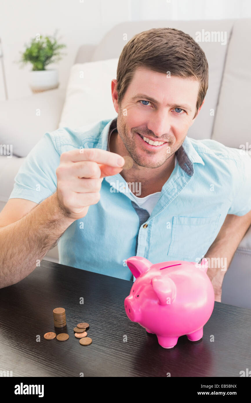 A man showing a pennie Stock Photo - Alamy