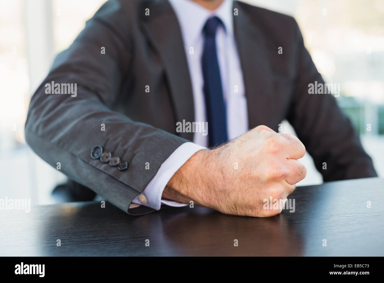 Angry businessman thump the table Stock Photo - Alamy