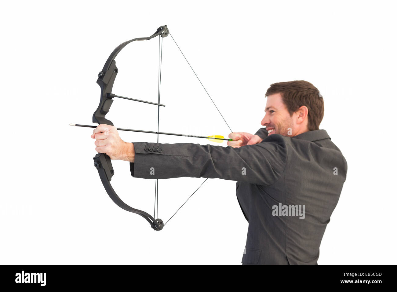 Handsome businessman shooting a bow and arrow Stock Photo - Alamy