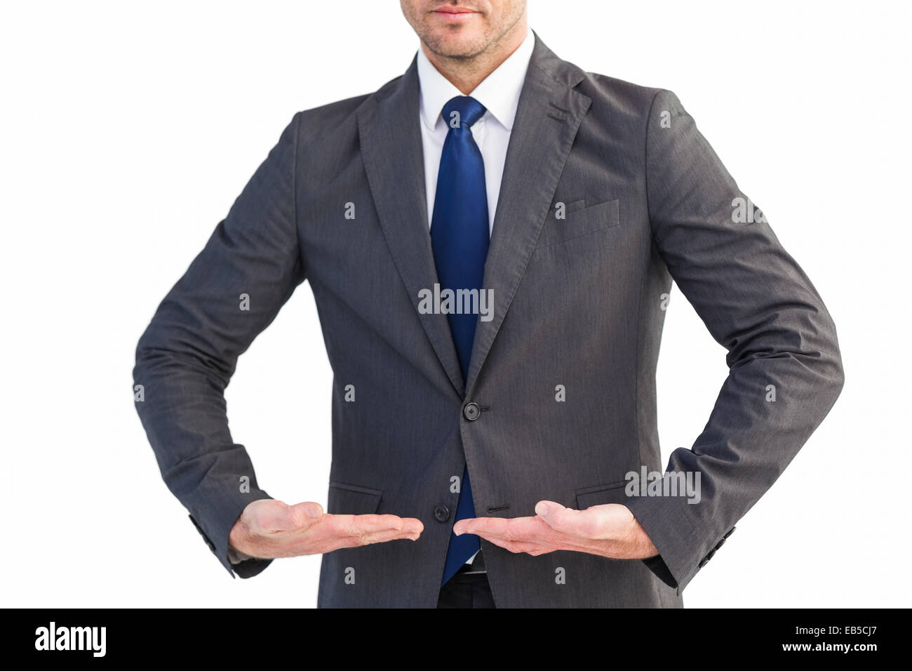 Businessman presenting your product with hands Stock Photo - Alamy