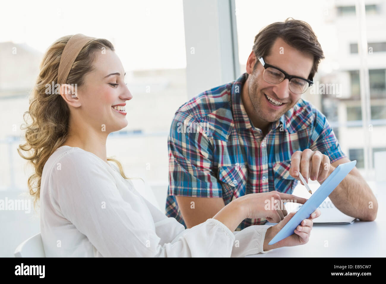 Creative business partners working together Stock Photo - Alamy