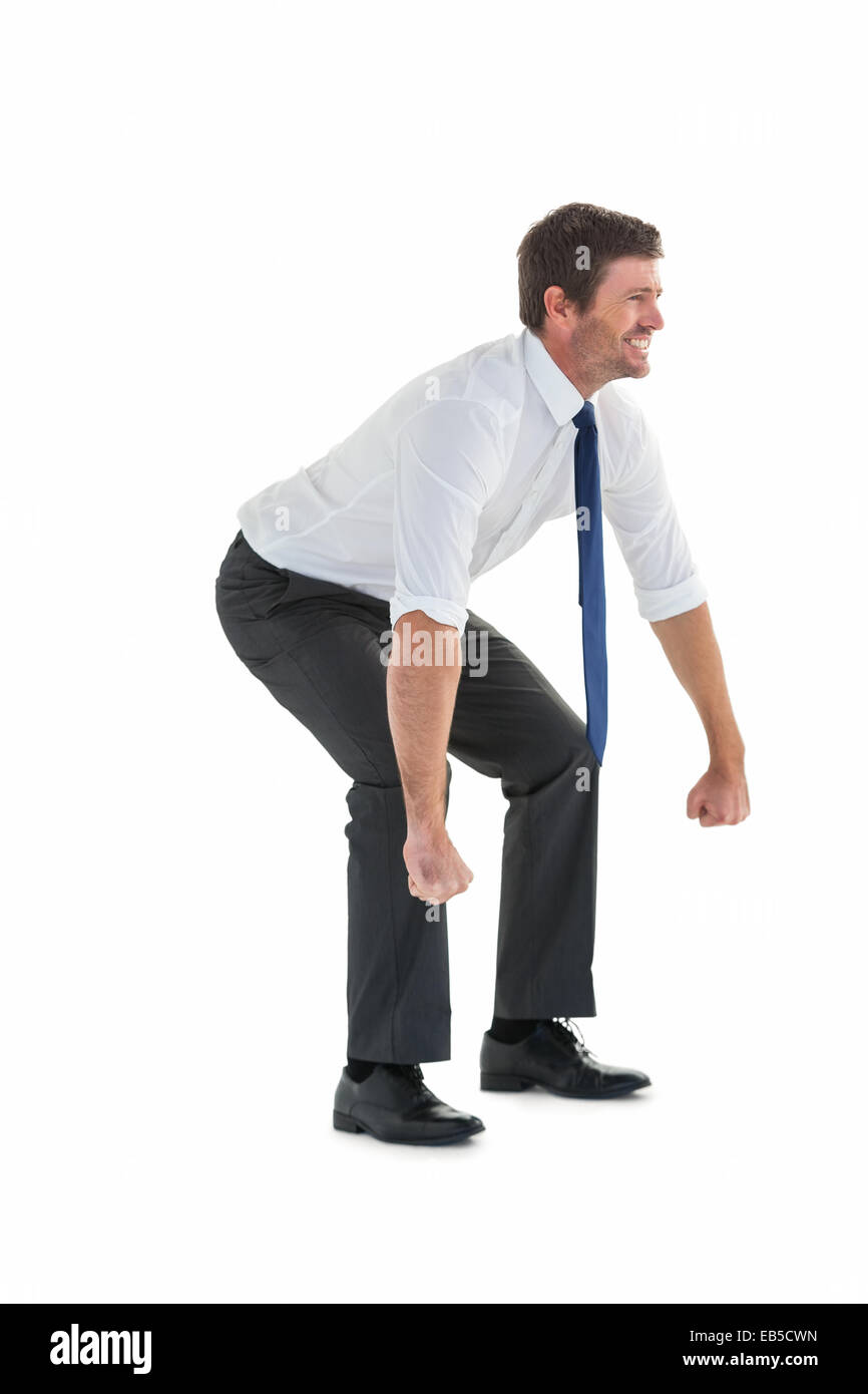 Strong businessman lifting up something Stock Photo - Alamy