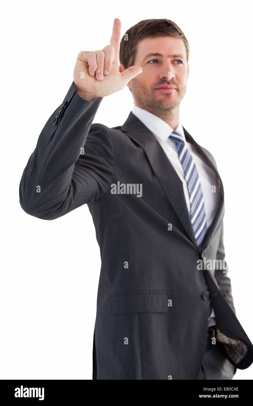 Serious man pointing standing hi-res stock photography and images - Alamy