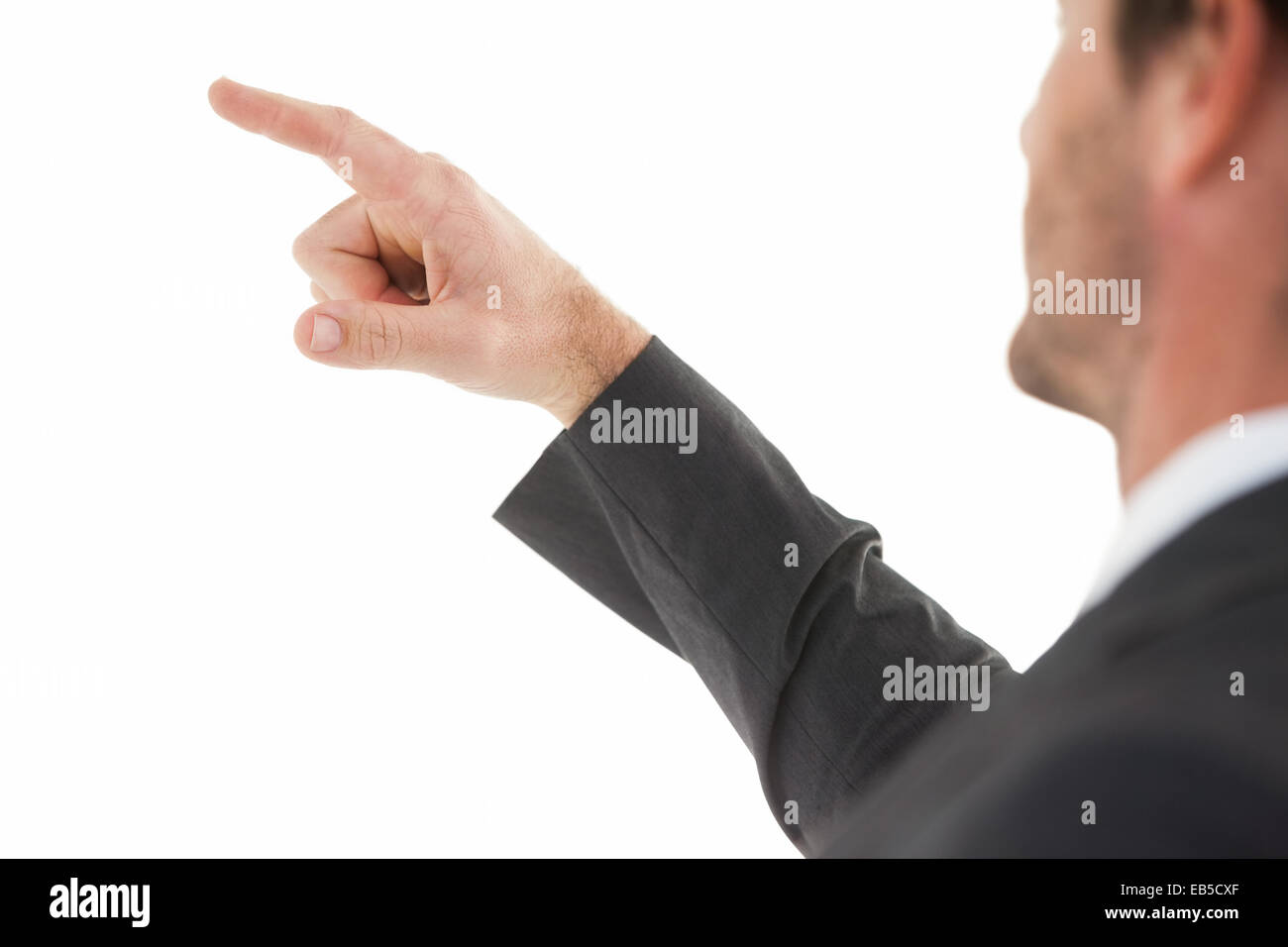 Handsome businessman pointing at something Stock Photo - Alamy