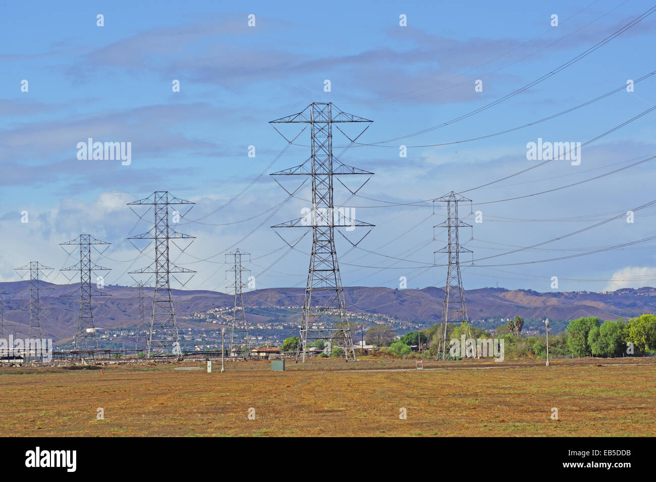 Electrical Power Towers at Suburban Field Stock Photo - Alamy