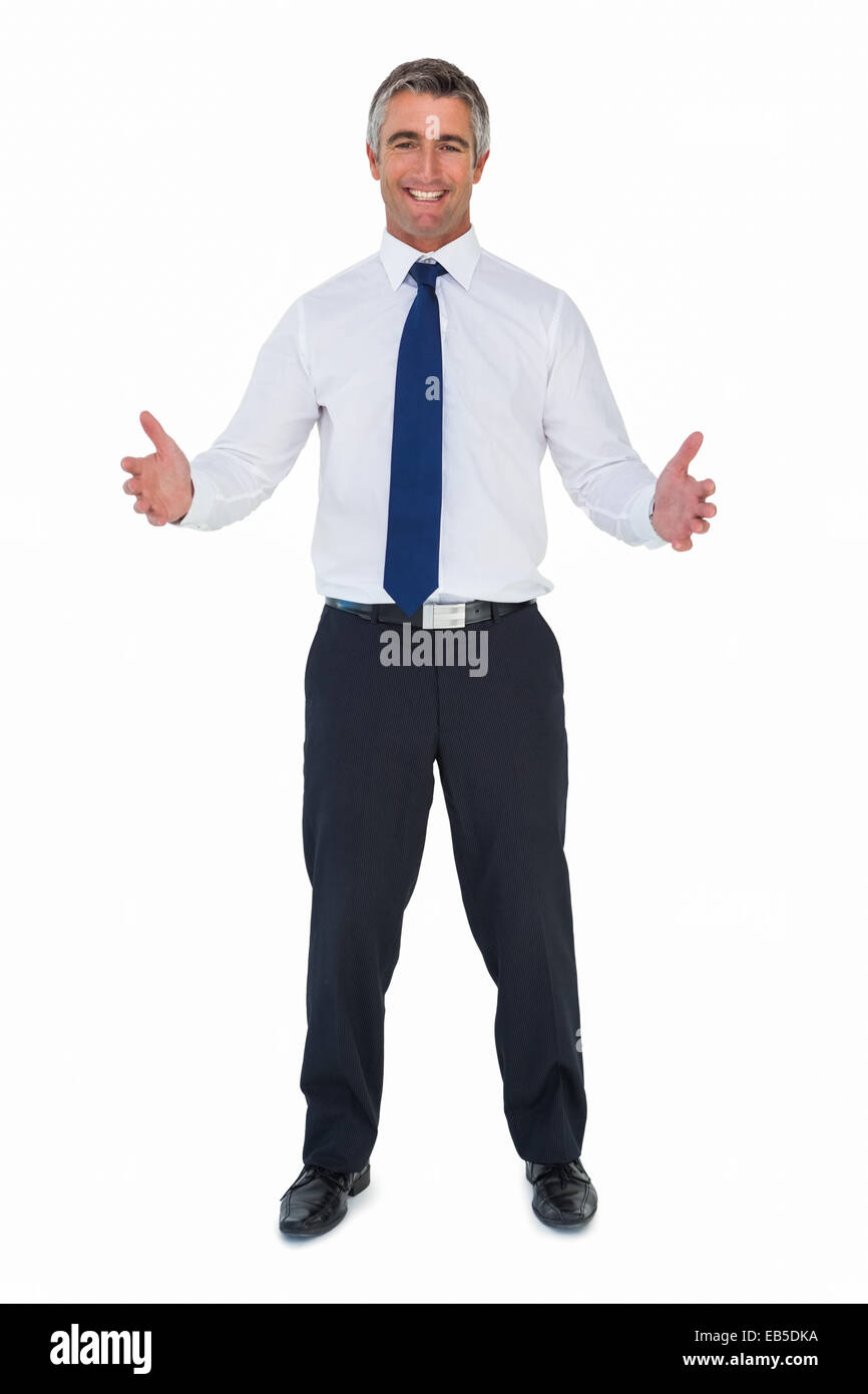 Happy businessman without jacket with arms out Stock Photo - Alamy