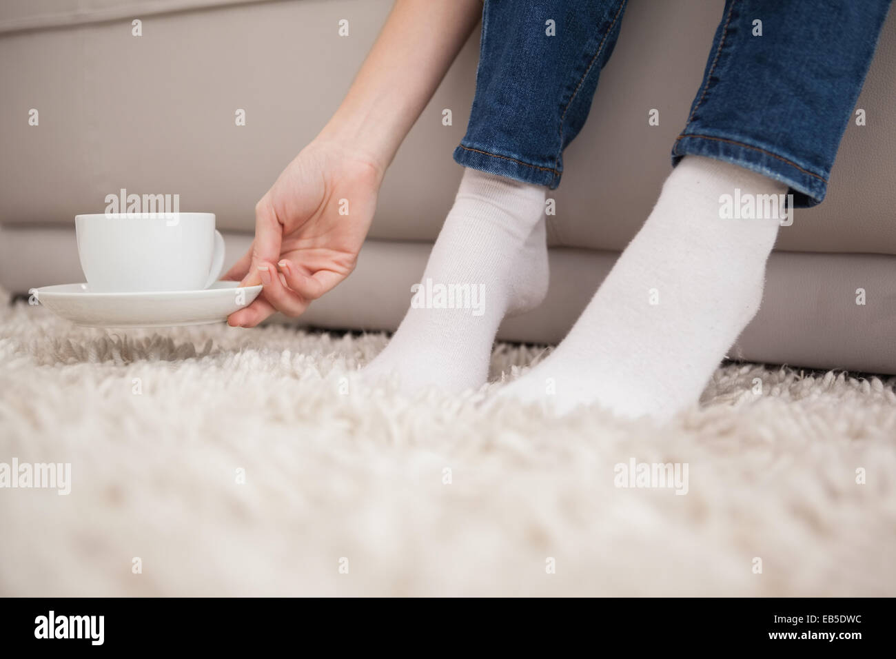 Picking up cup hi-res stock photography and images - Alamy