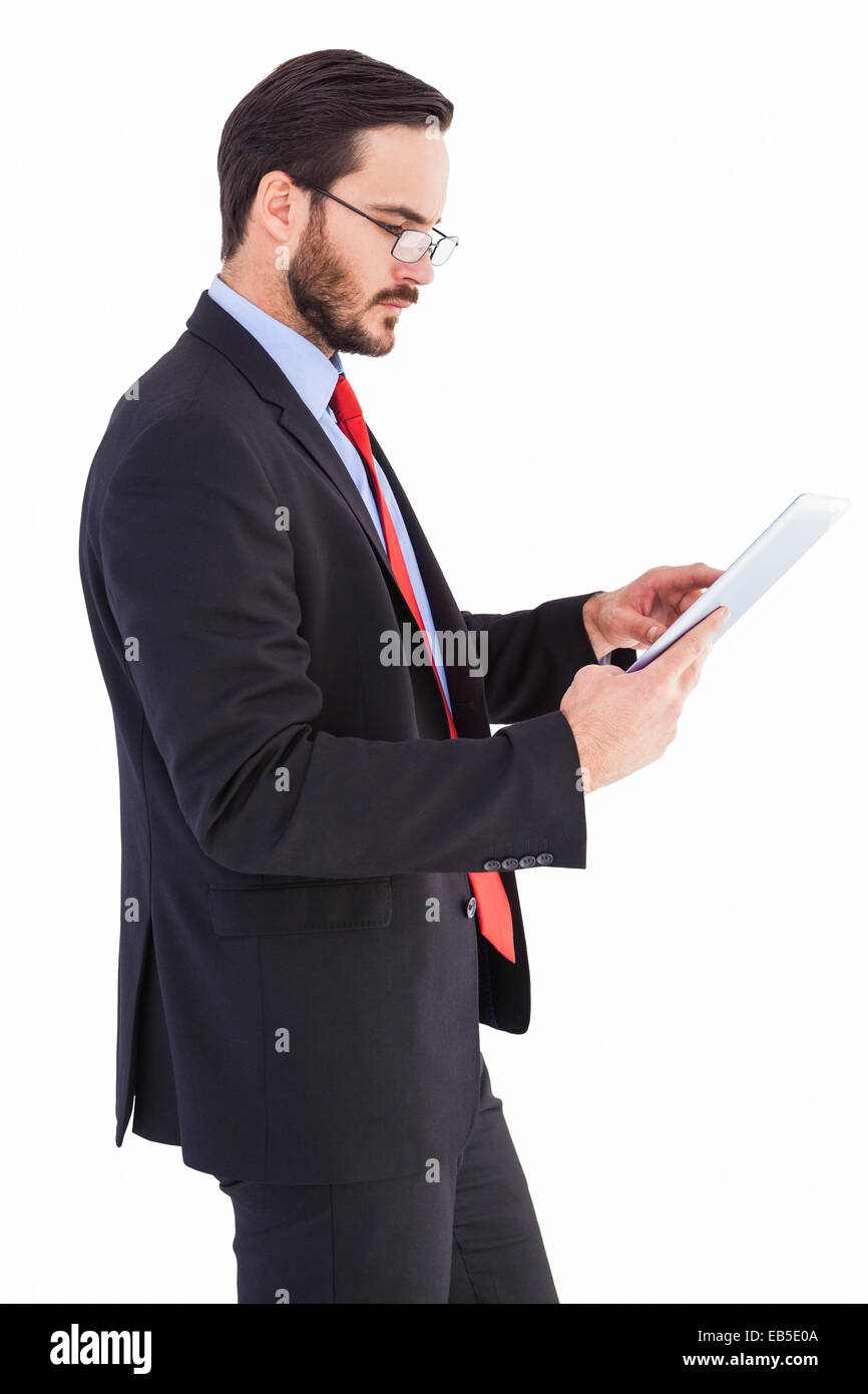 Businessman scrolling on his digital tablet Stock Photo - Alamy