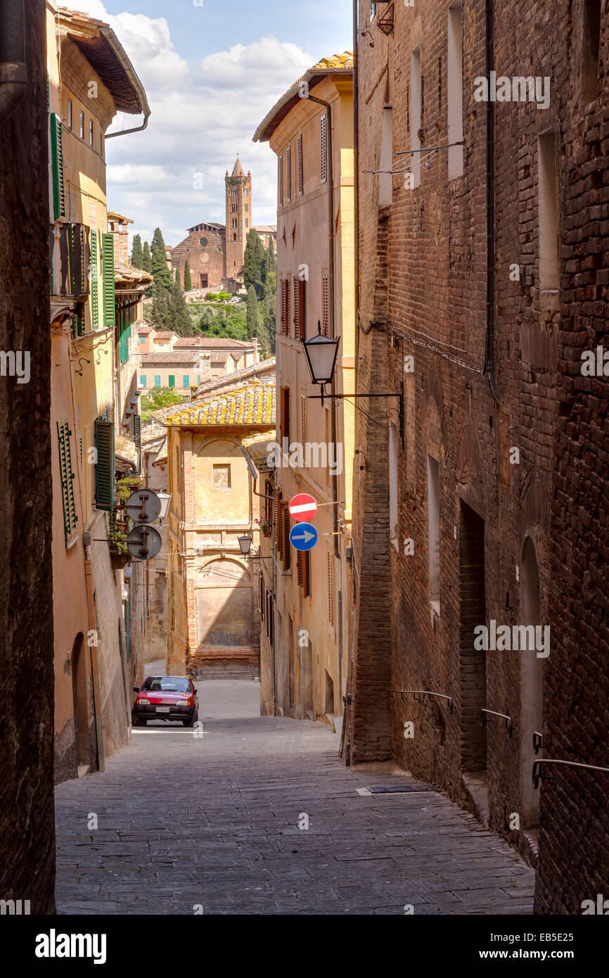 The narrow medieval streets of Siena, Italy. The historic centre has ...