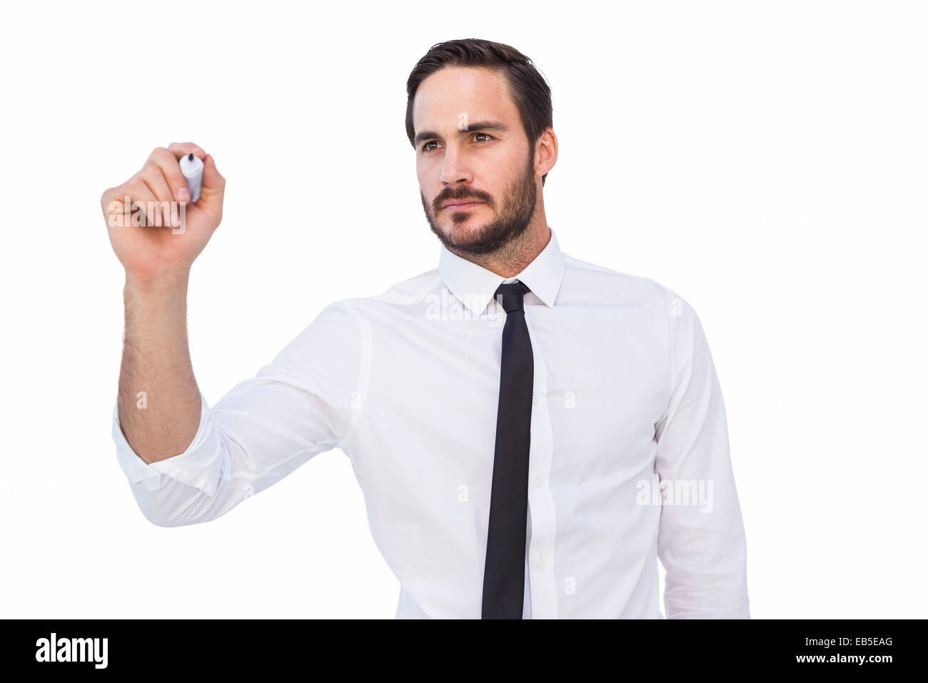 Focused businessman writing with marker Stock Photo - Alamy