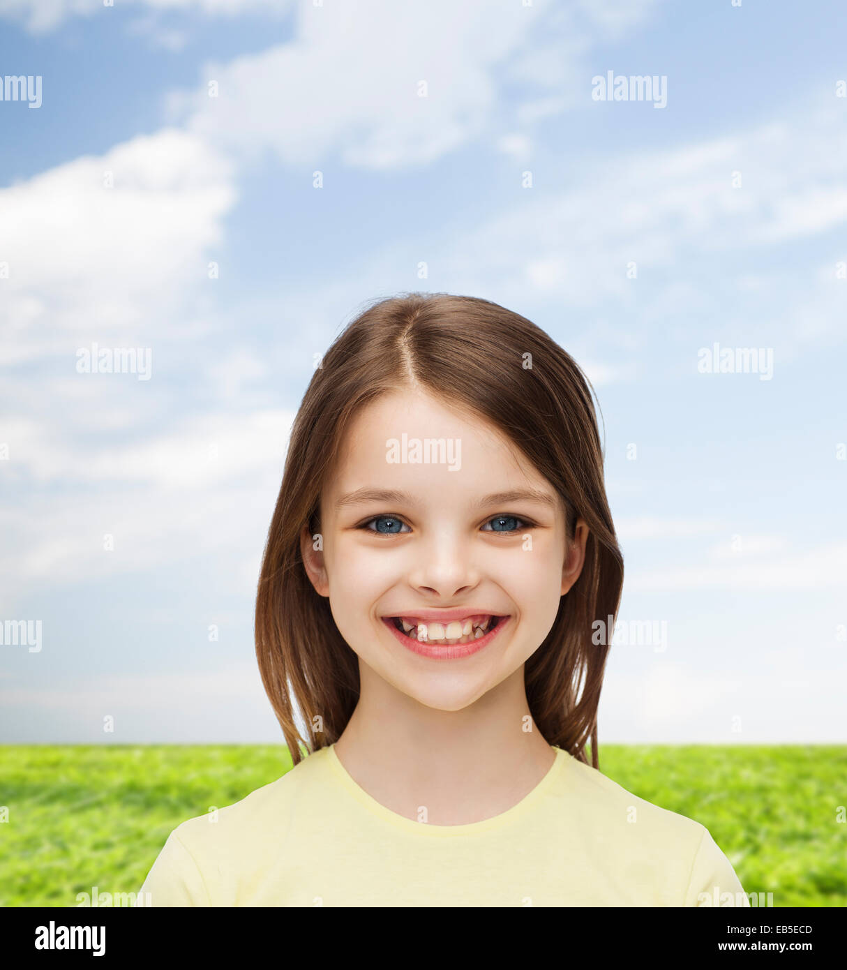 smiling little girl over white background Stock Photo - Alamy
