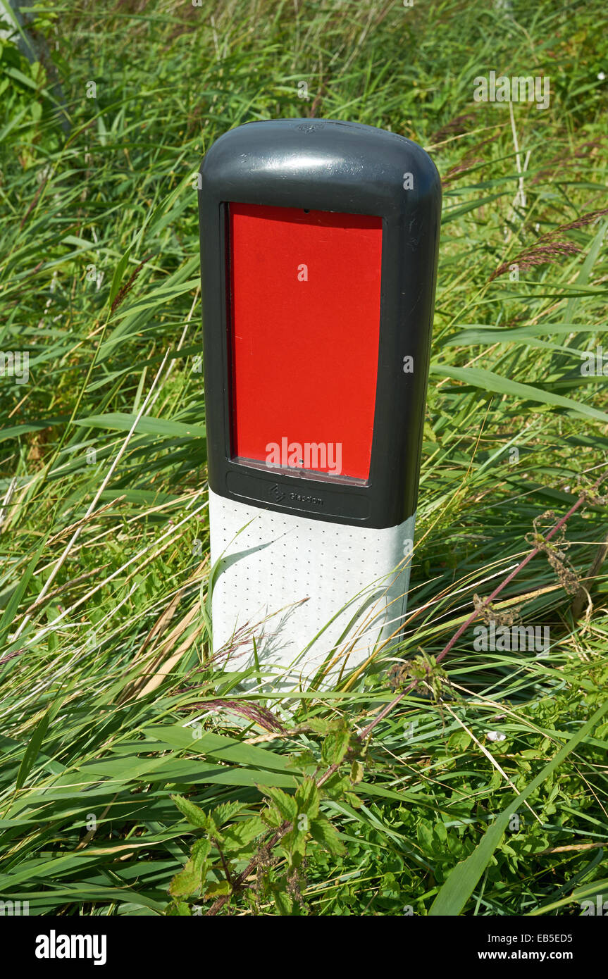 Roadside bollard with reflector manufactured by Glasdon Stock Photo - Alamy