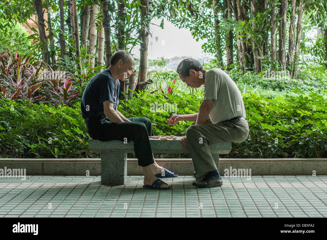 Two men sitting on a bench hi-res stock photography and images - Alamy