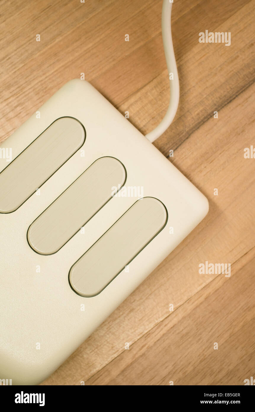 vintage corded optical mouse on a wood surface Stock Photo - Alamy