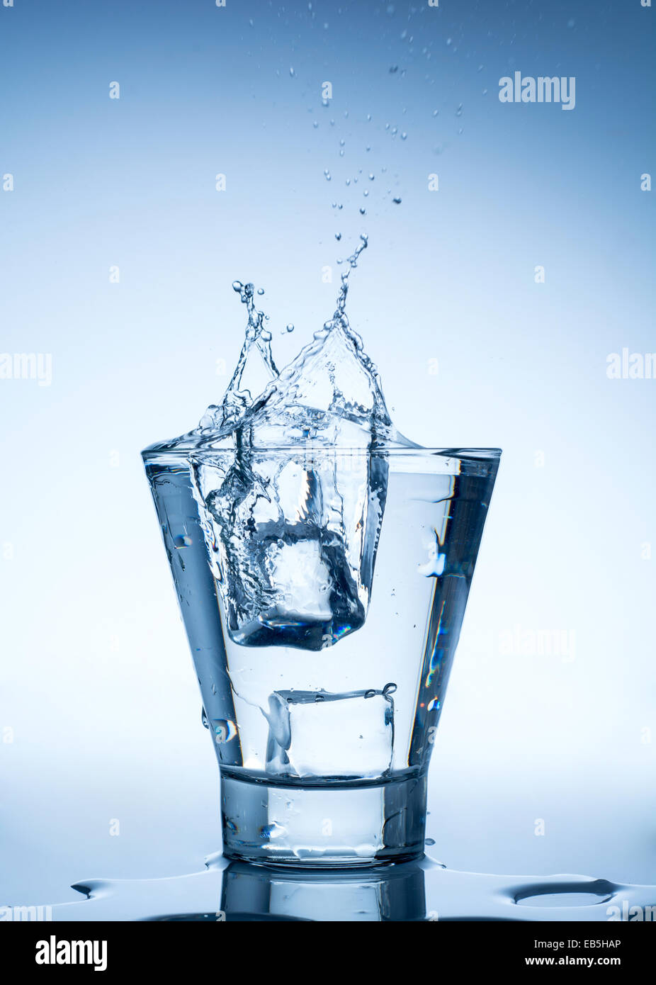 water splash in glass isolated on white Stock Photo - Alamy