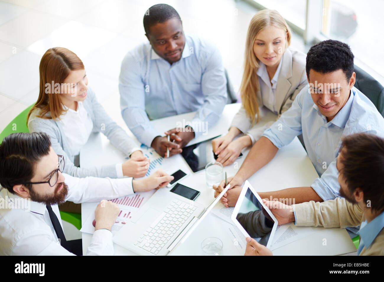 Partners gathering for panel discussion Stock Photo - Alamy