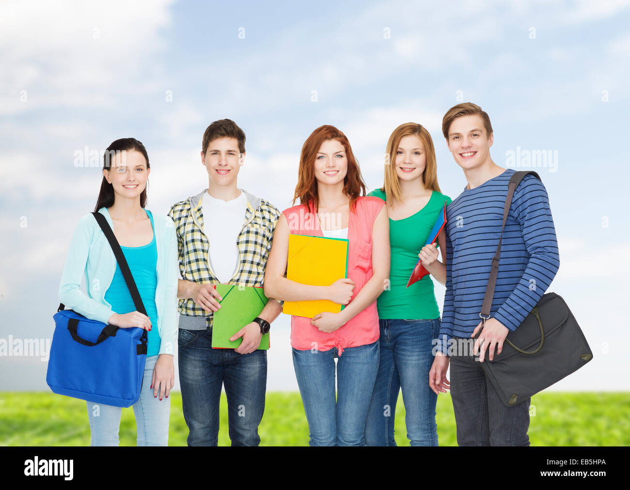 group of smiling students standing Stock Photo - Alamy