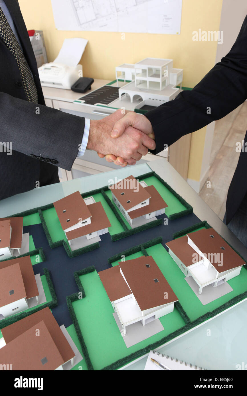Close-up of architects shaking hands Stock Photo - Alamy
