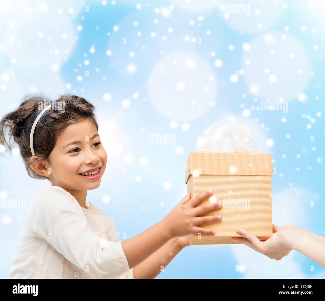 smiling little girl with gift box Stock Photo - Alamy