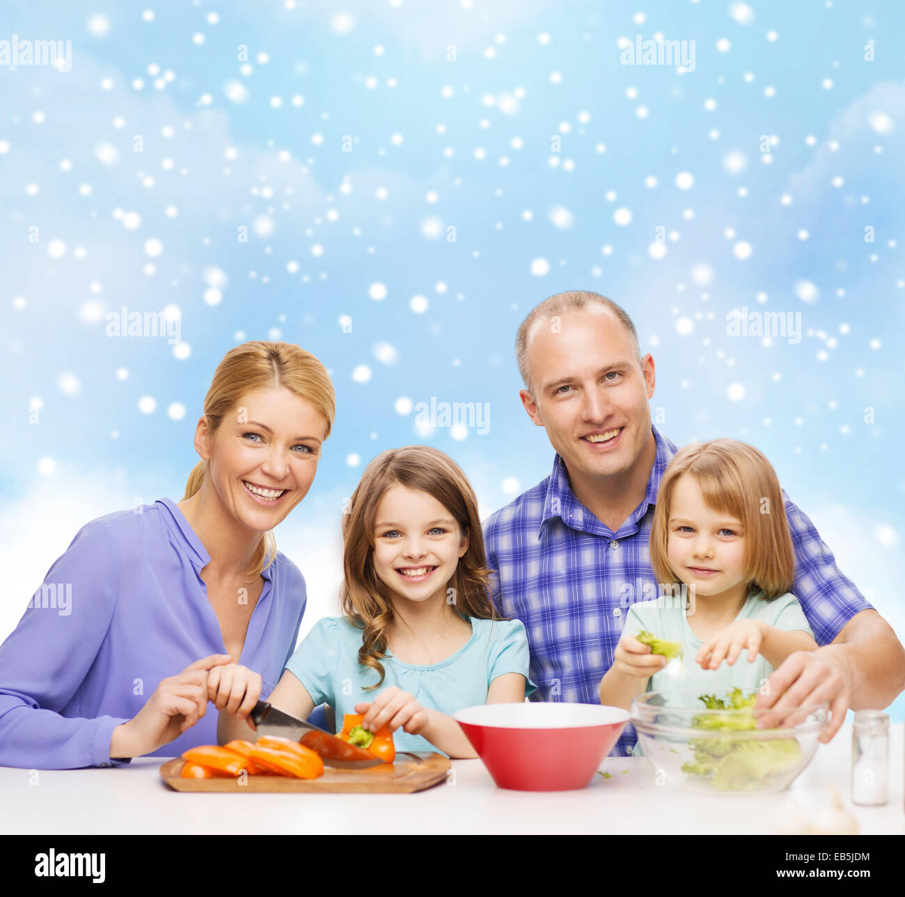 happy family with two kids making dinner at home Stock Photo - Alamy