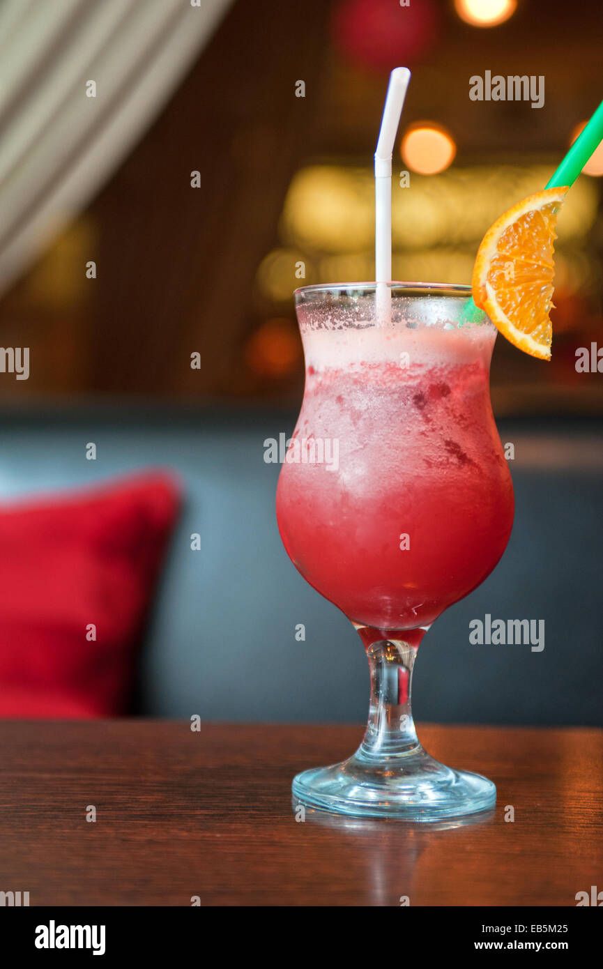 berry milkshake with orange fruit Stock Photo - Alamy