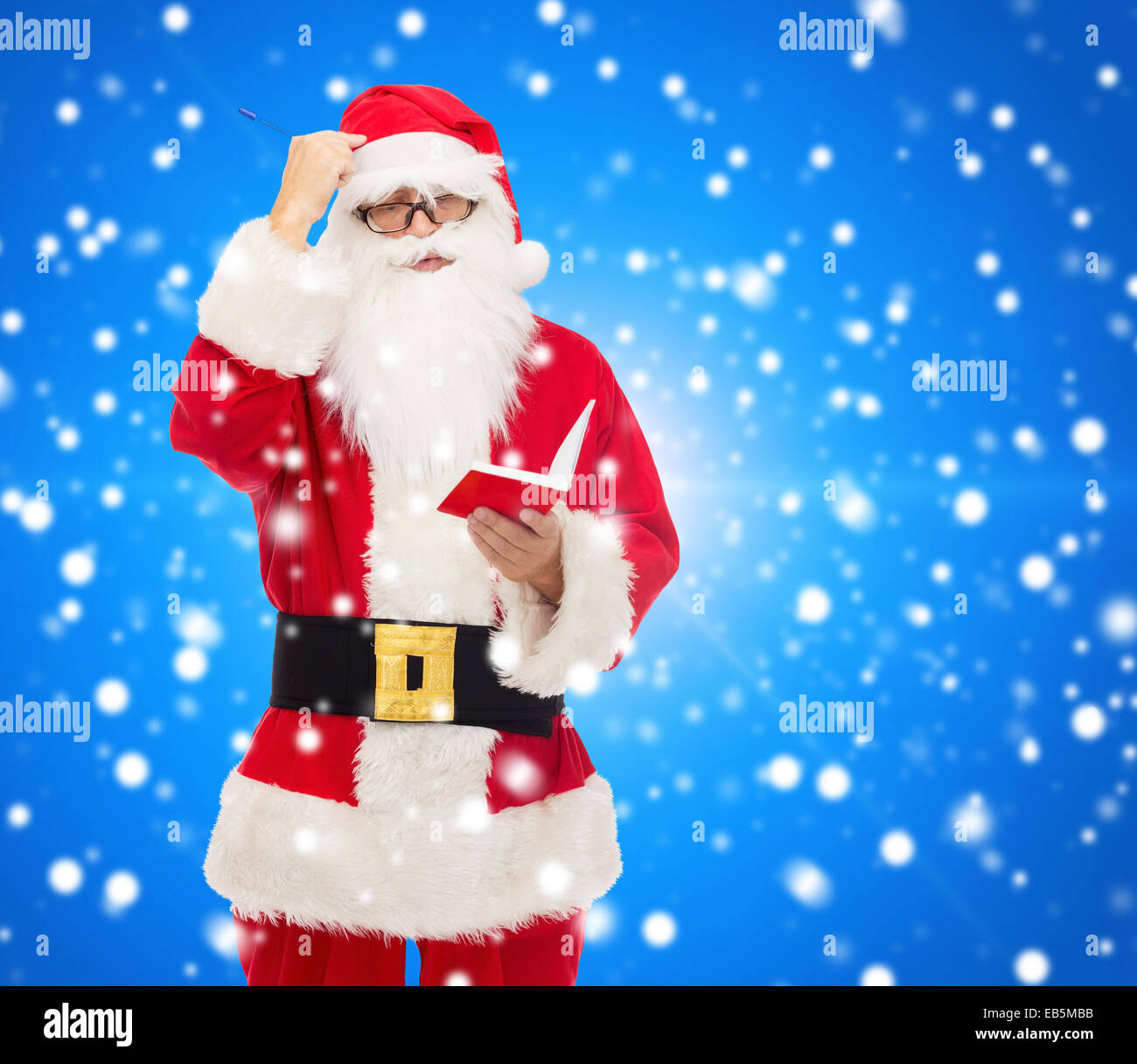man in costume of santa claus with notepad Stock Photo - Alamy