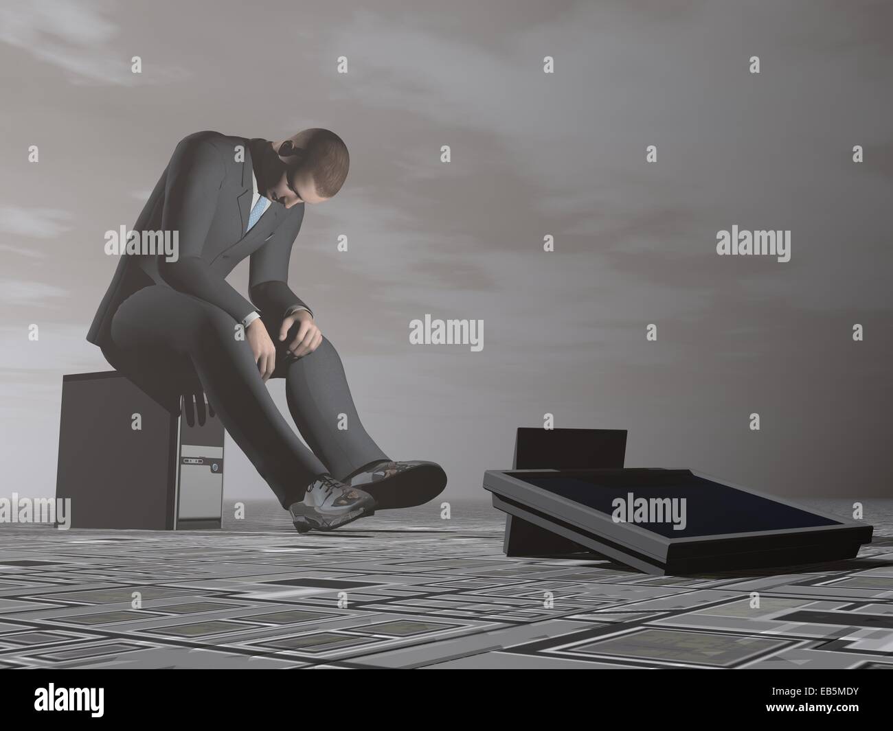 Businessman sitting on a computer looking exhausted in grey dark ...