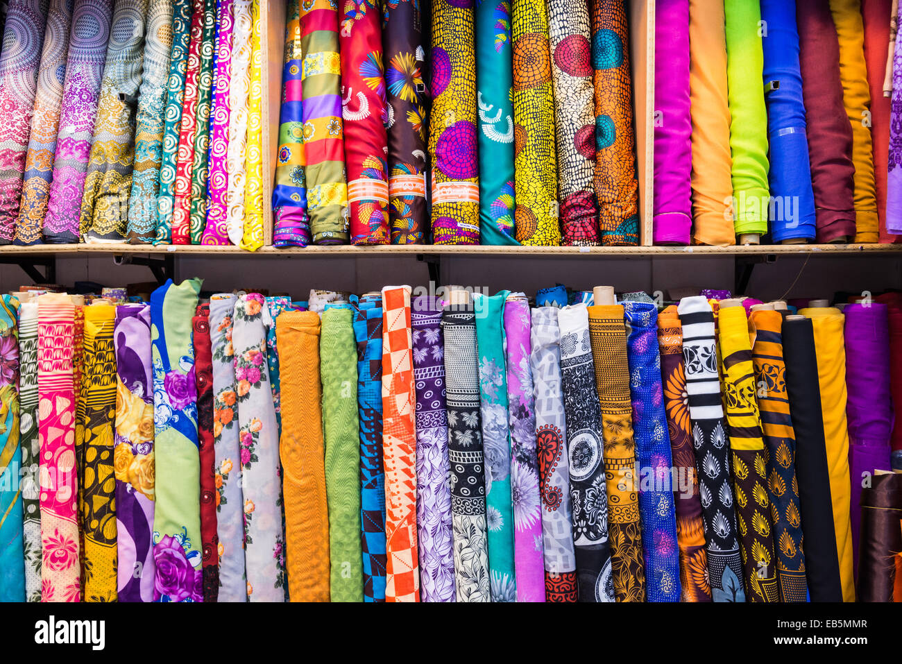 Rolls colorful textiles in a store at the Souq Muttrah, Muscat, Oman ...
