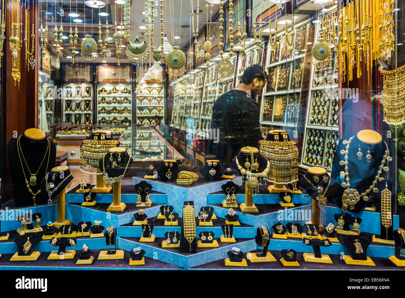 Gold jewelries displayed in a store window. Souq Muttrah, Muscat, Oman ...