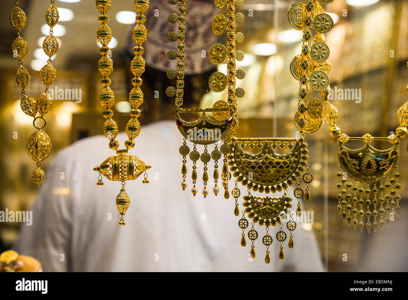 Gold jewelries displayed in a store. Souq Muttrah, Muscat, Oman Stock ...