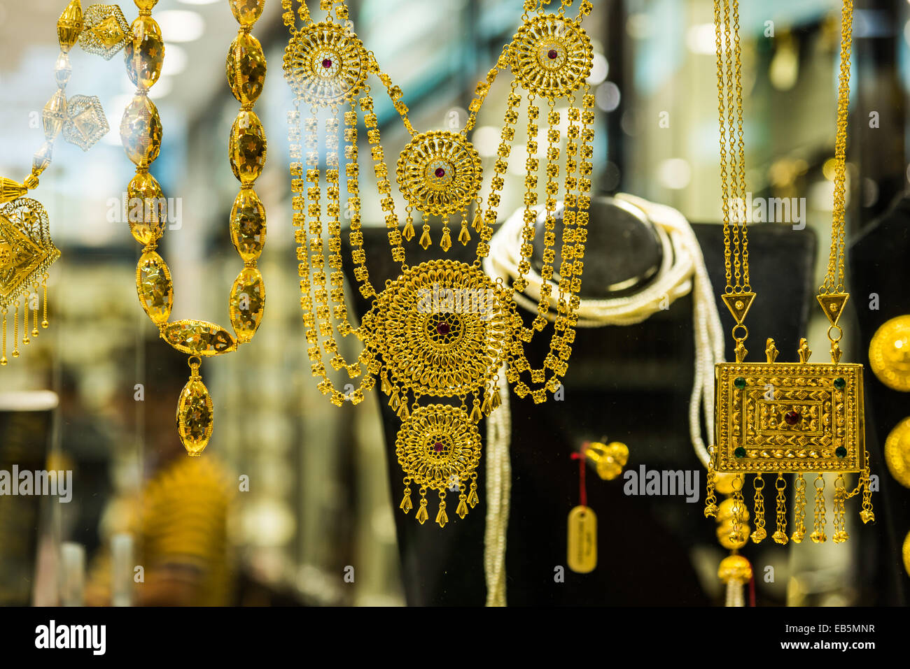 Gold jewelries displayed in a store. Souq Muttrah, Muscat, Oman Stock ...
