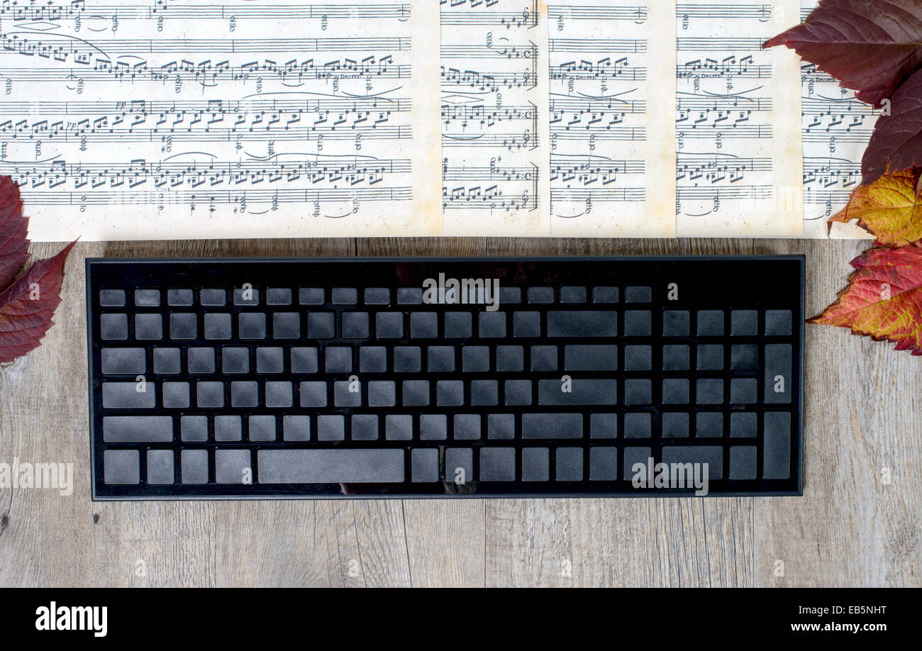 music scores with a computer keyboard Stock Photo - Alamy