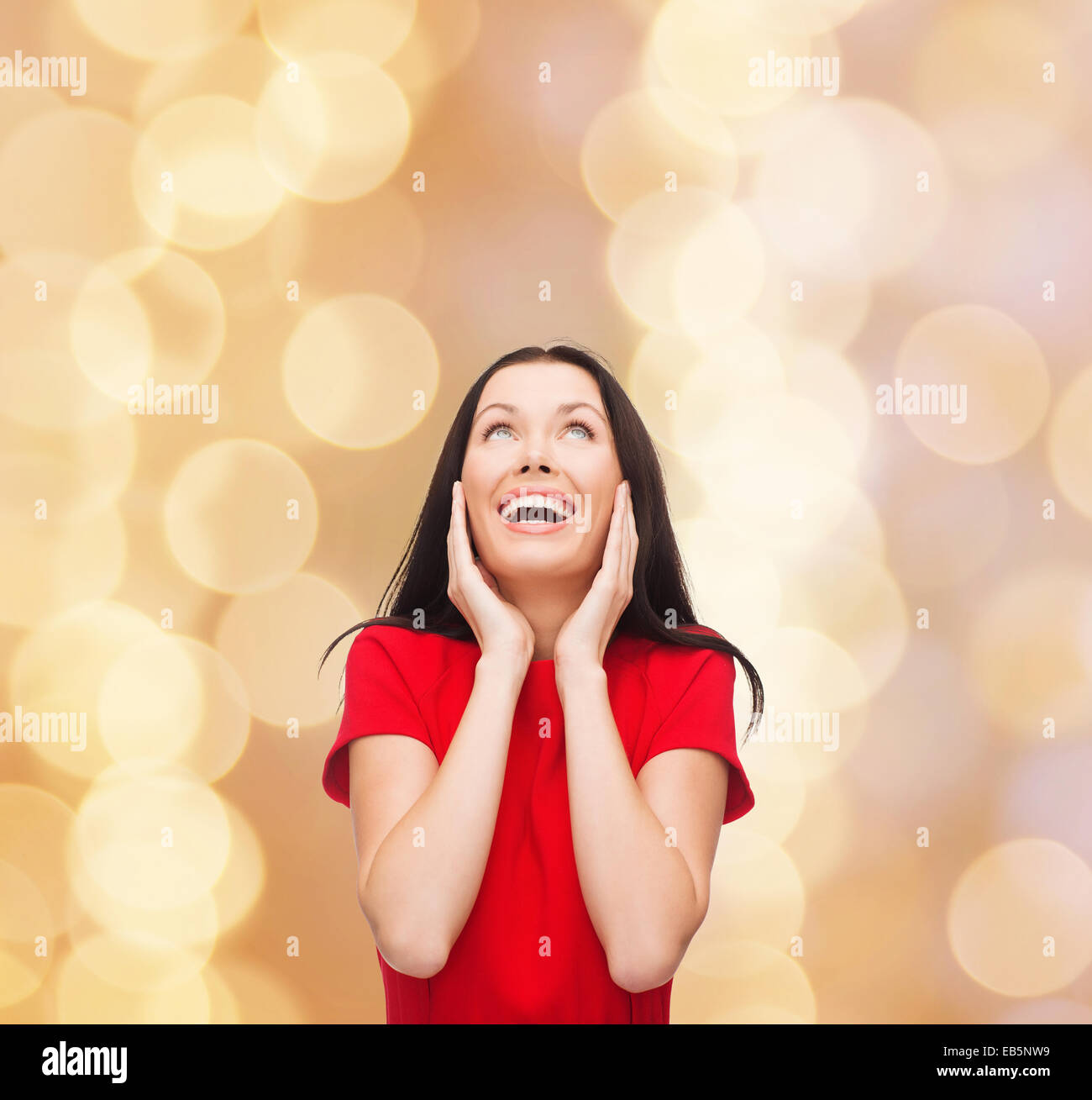 smiling woman in red dress Stock Photo - Alamy