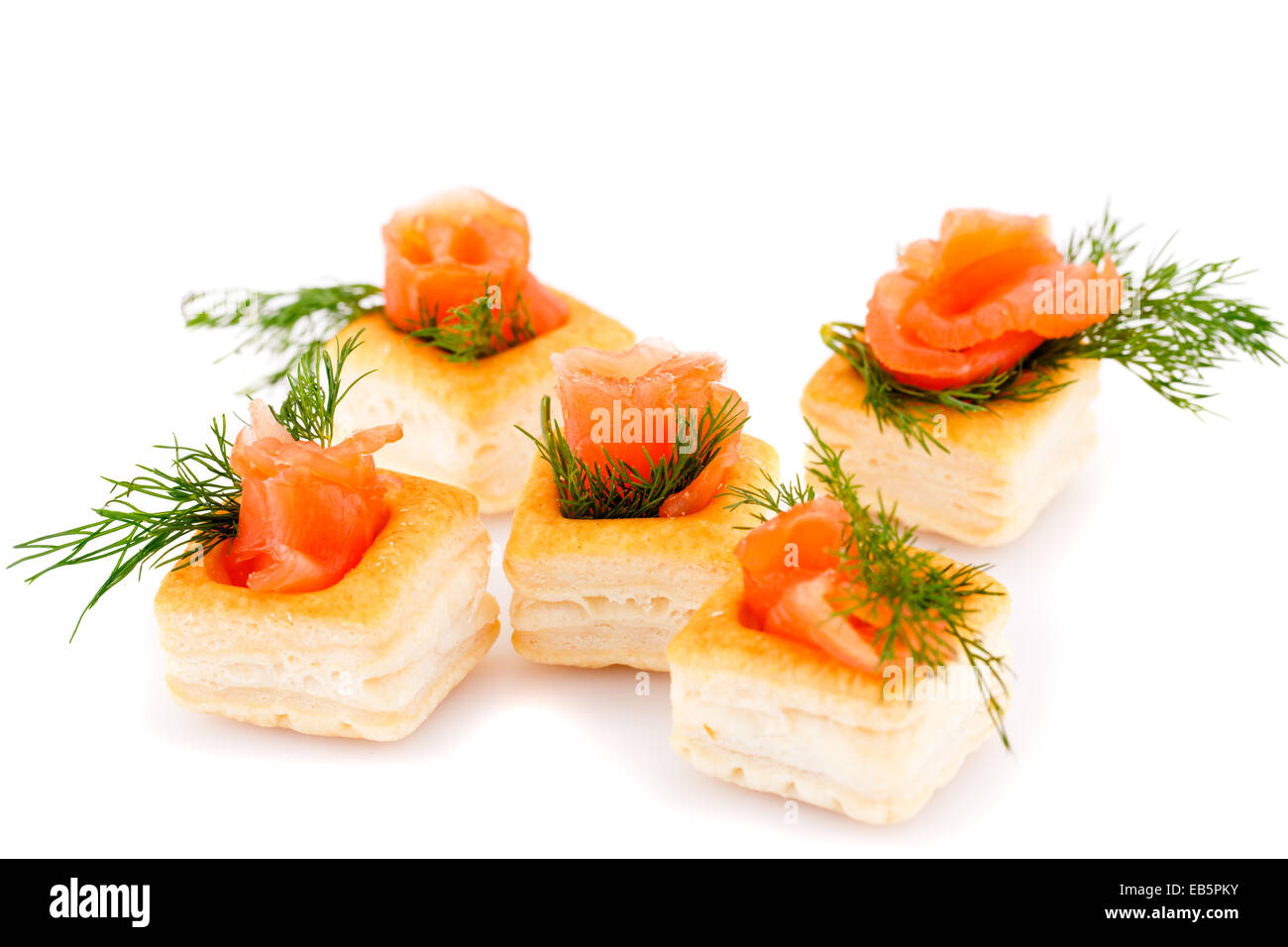 Salmon rolled fillet in pastries isolated on white background Stock ...